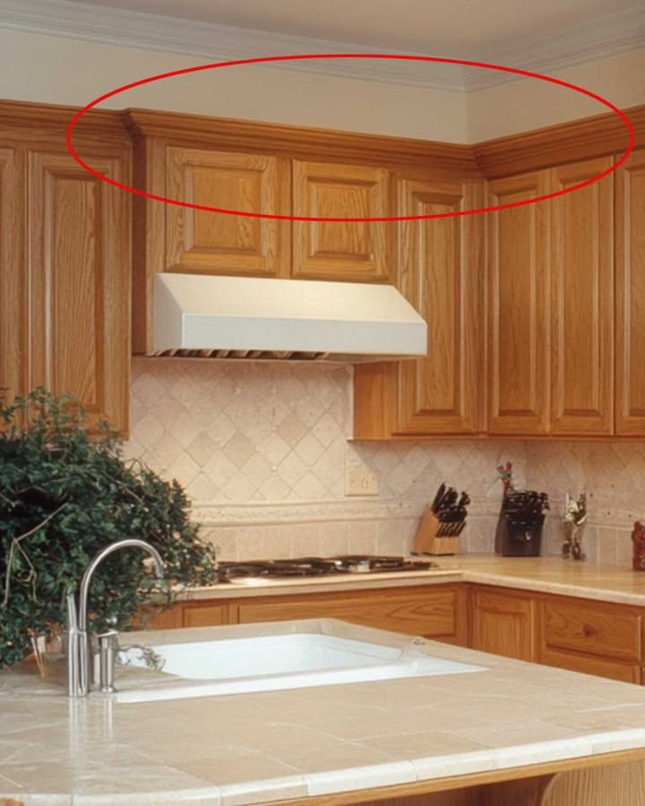 Most people believe the tops of kitchen cabinets serve no purpose. Here ...